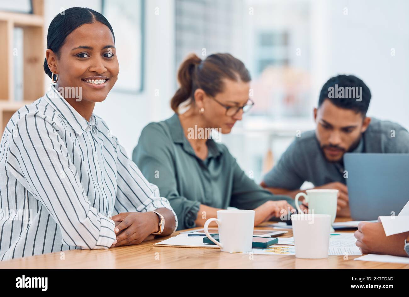 Meeting, collaboration and training with a black woman in the boardroom with her business team ...