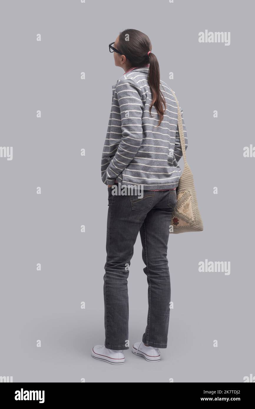 Pensive casual woman standing and thinking, full-length portrait Stock ... Pensive casual woman standing and thinking, full-length portrait Stock ...