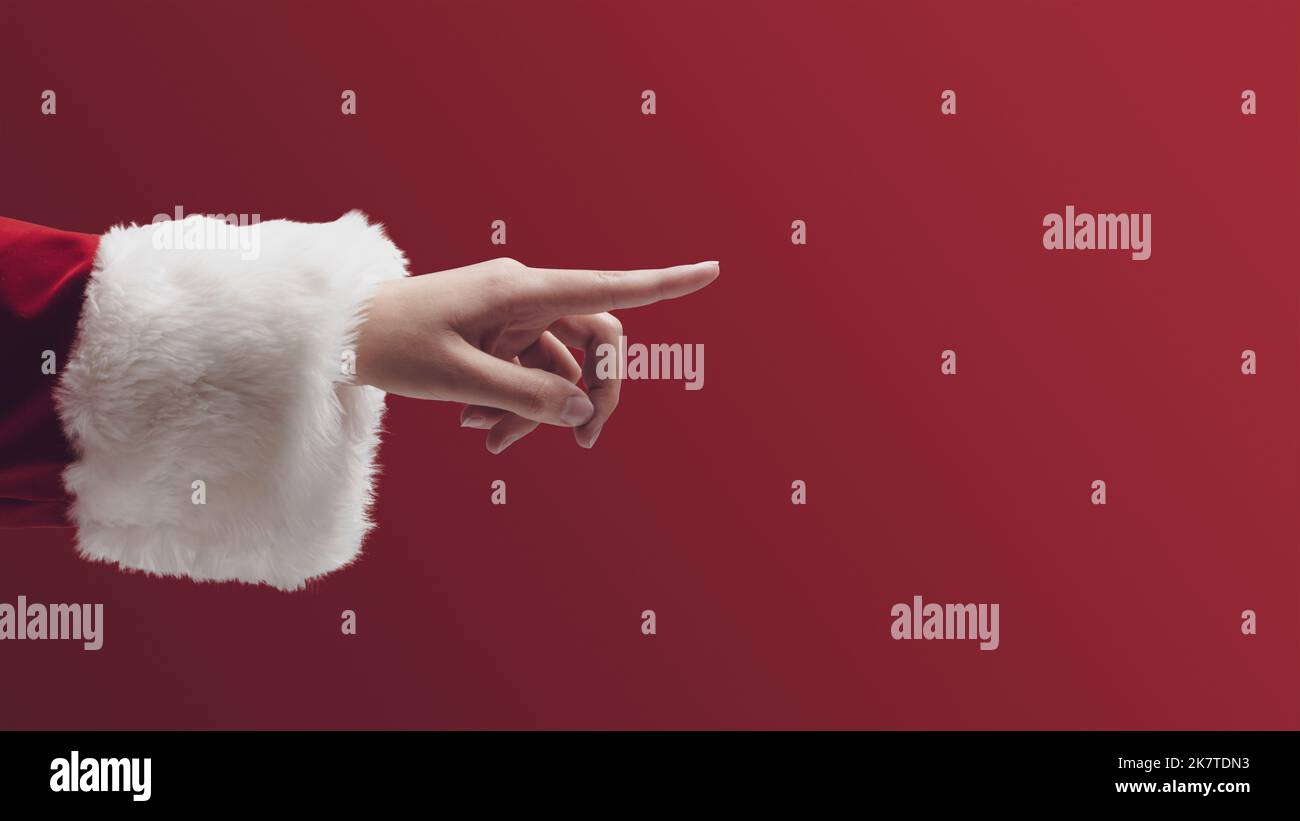 Santa claus gesture pointing finger hi-res stock photography and images ...