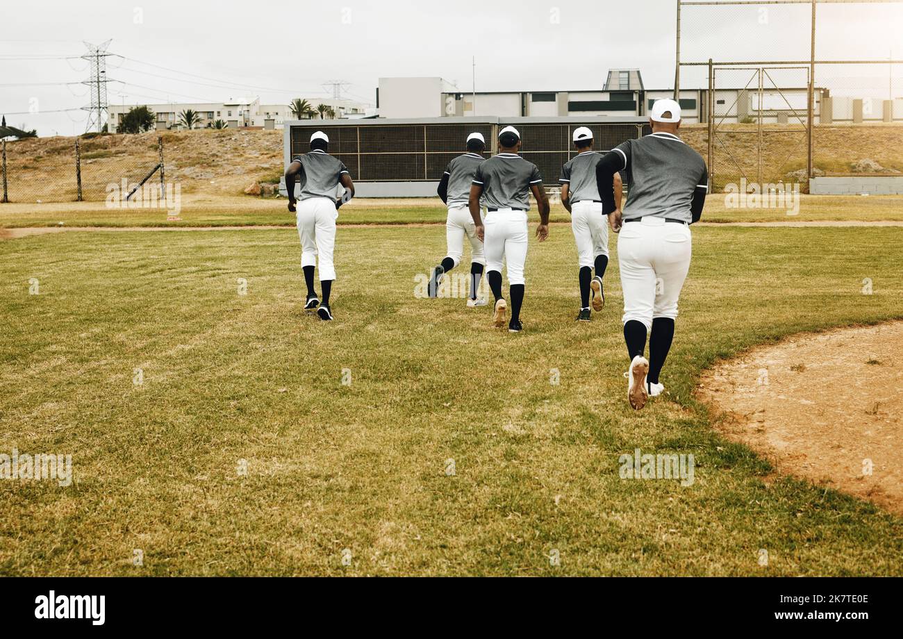 Baseball, sports and team running on field ready to start training ...