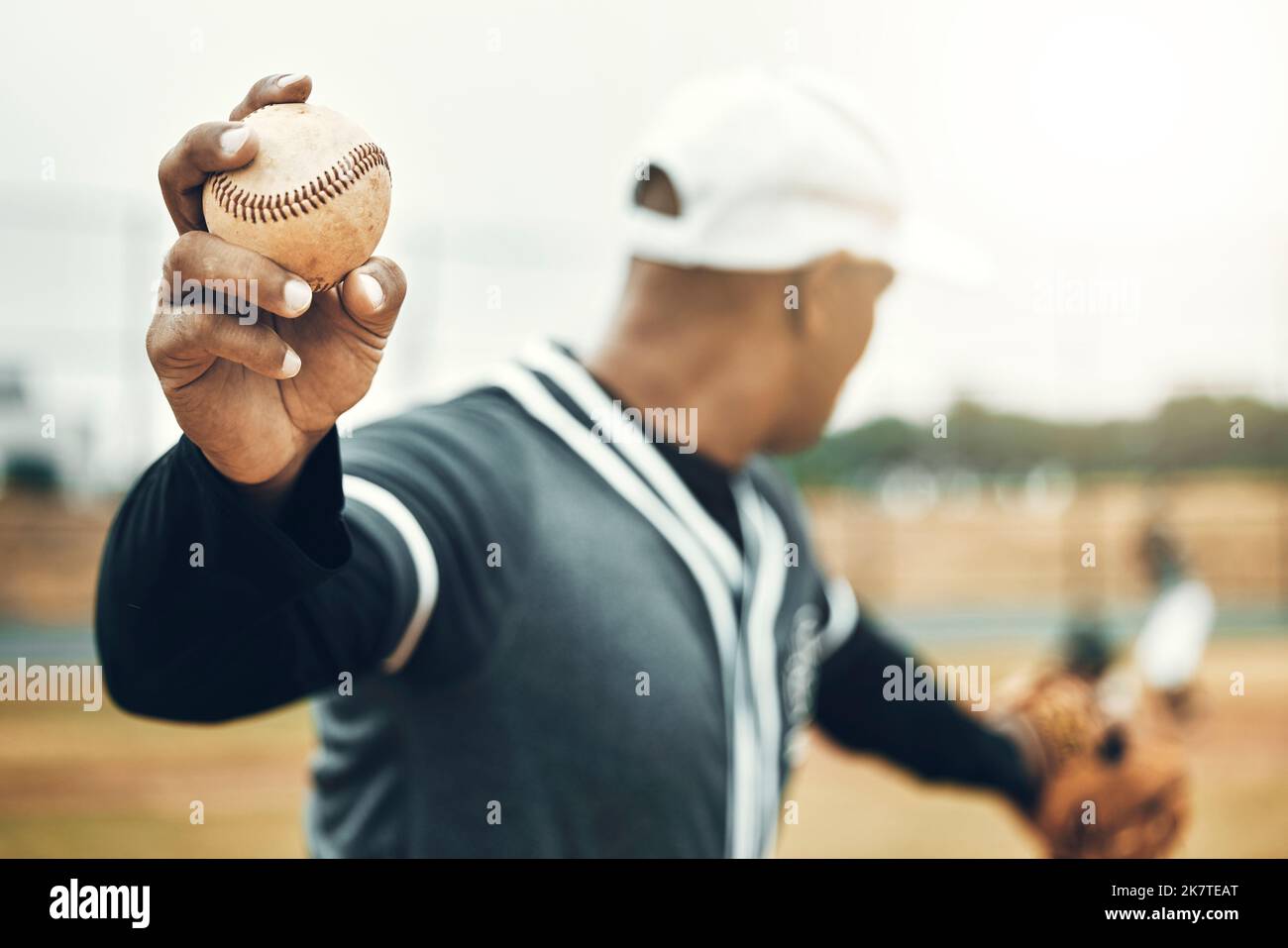 Baseball, athlete hand and ball sports while showing grip of pitcher ...