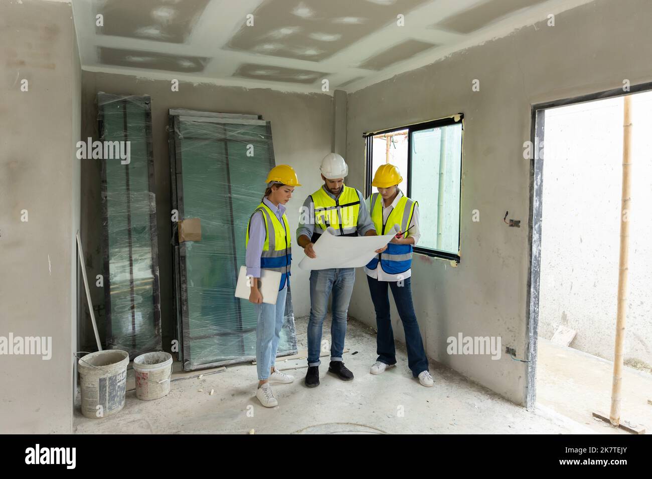 architect builder engineer team meeting talking together at ...