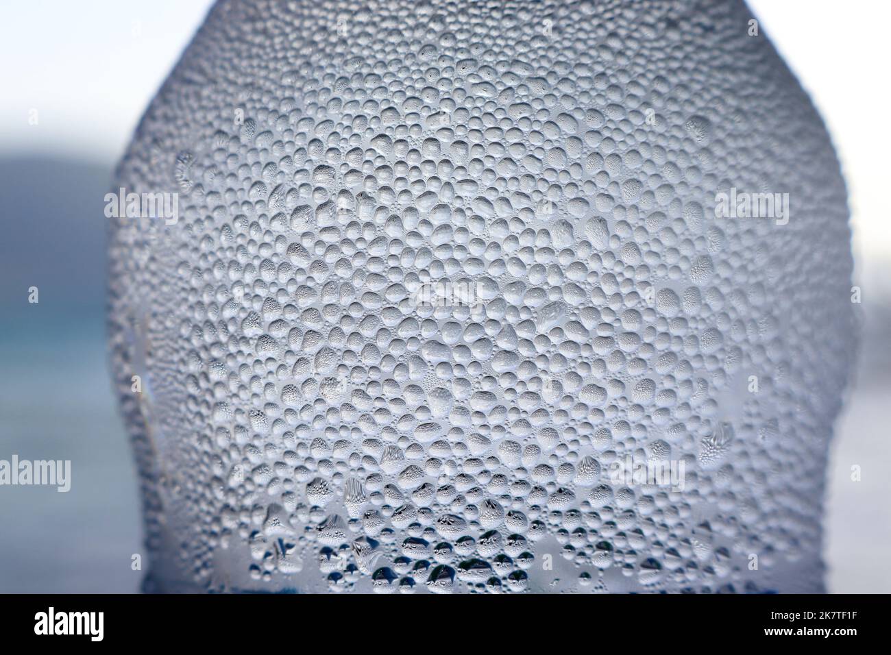 Cold surface of water bottle with sparkling bubbles macro shot Stock ...