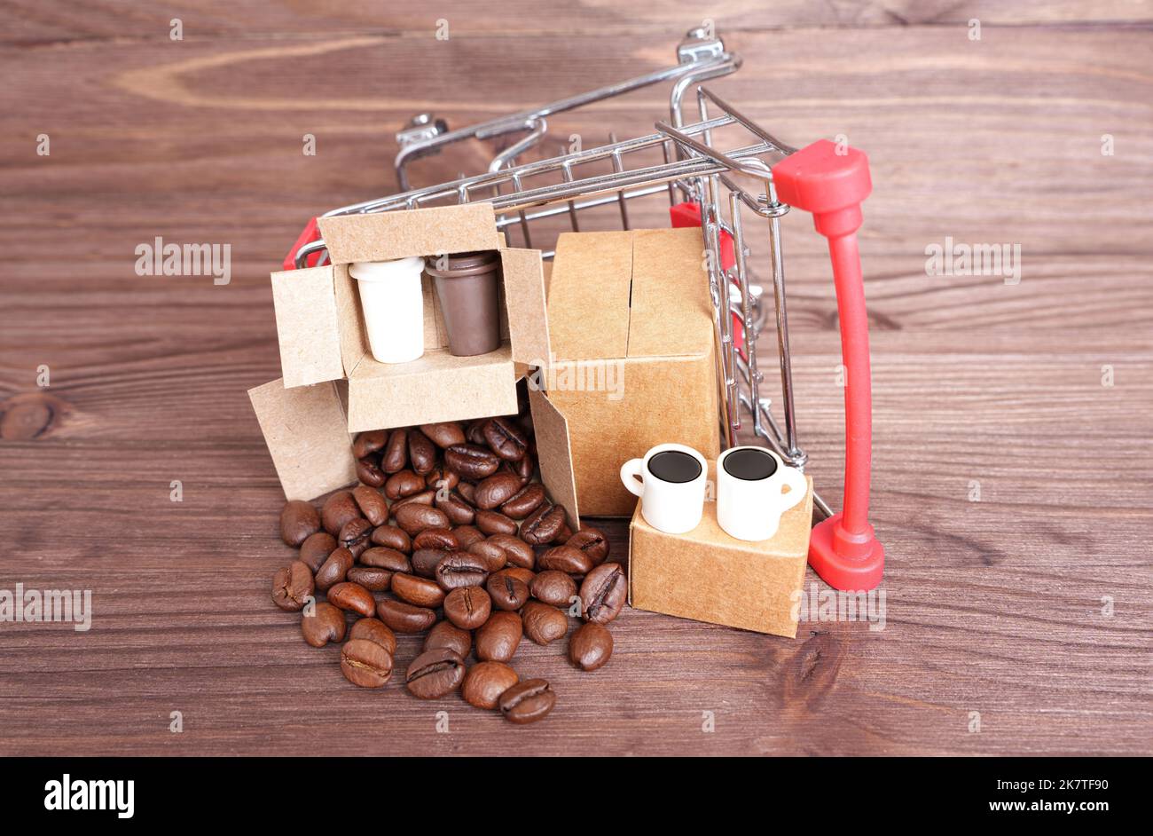 Bunch of tiny shipping boxes with roasted coffee beans and cups by an ...