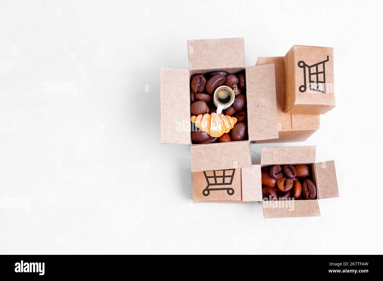 Creative cafe supplies concept: tiny cardboard boxes full of roasted ...