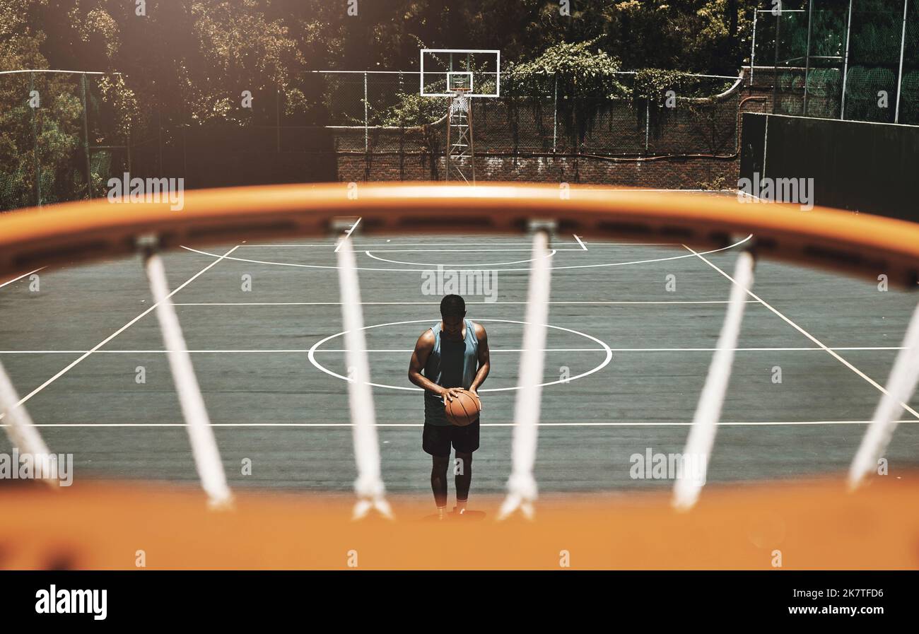 Above, net and basketball man with aim in training, practice or ...