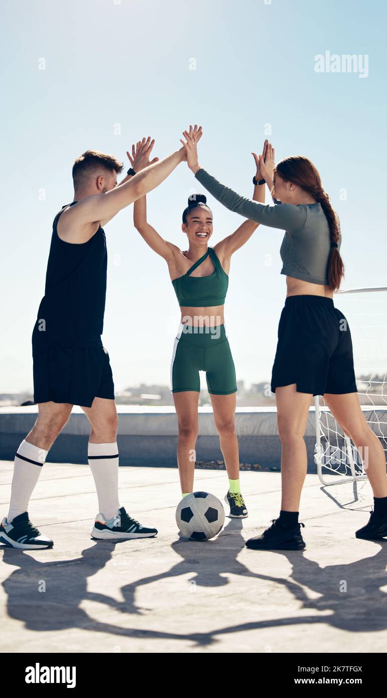 High five, fitness and soccer team together and motivation for sports ...