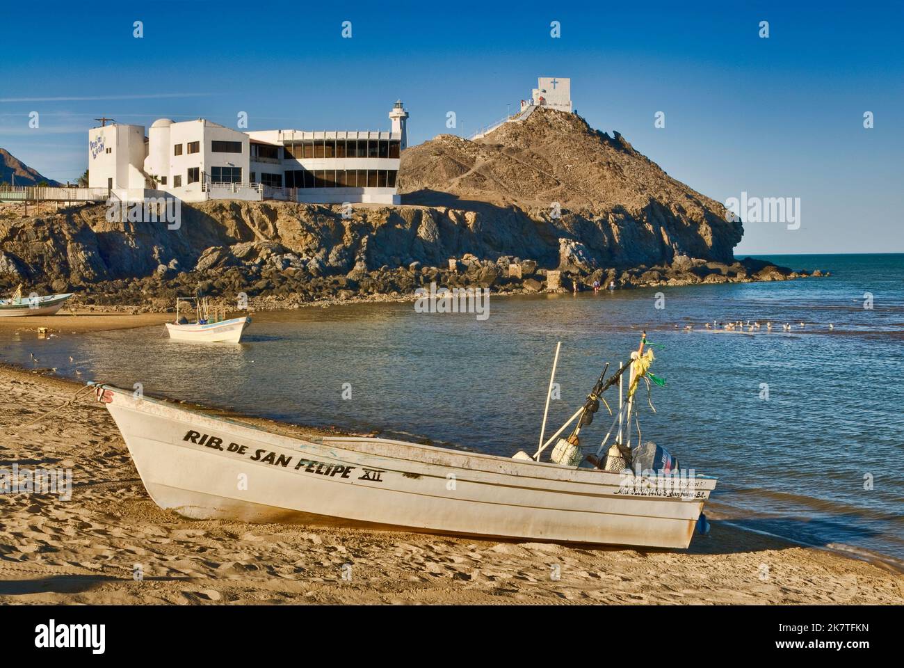 Boats on beach at Bahia de San Felipe, Cerro el Machorro in distance ...