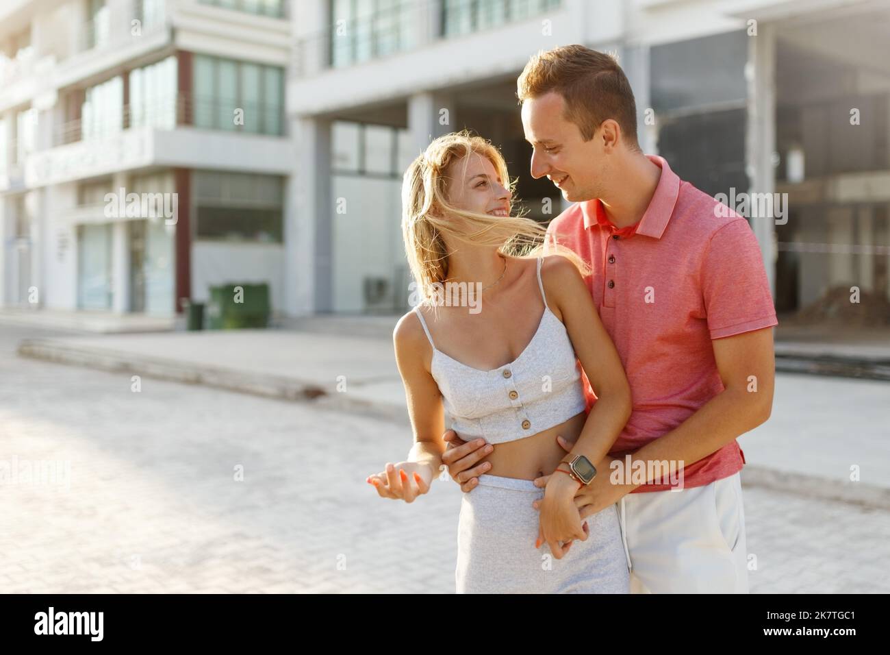 Lovely happy couple.Hugs together and smile in sunset light Stock Photo ...