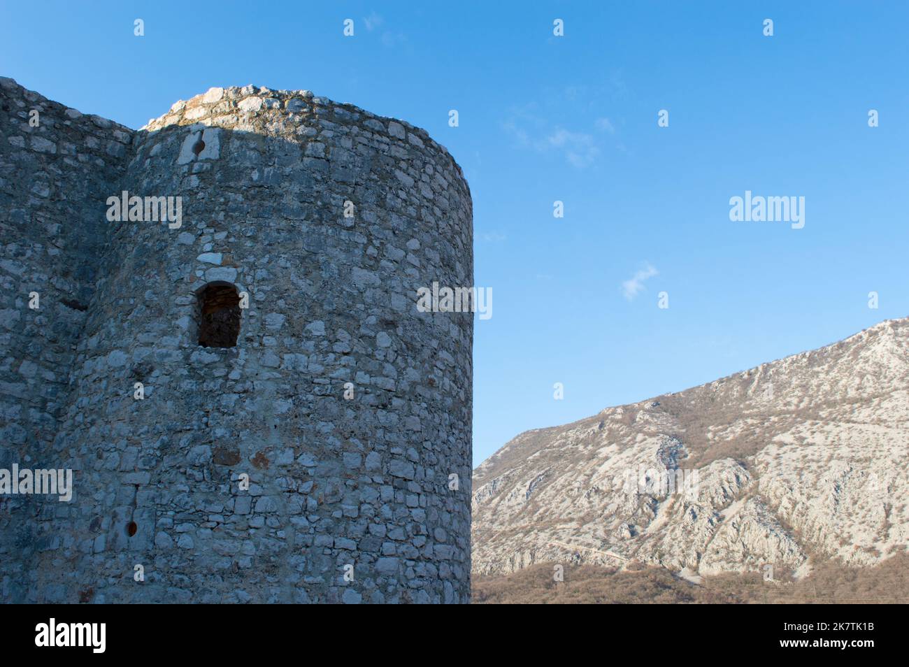 Medieval stone tower with small window, on the hill in Drivenik ...