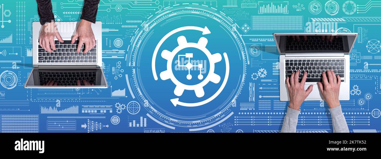 Top view of hands using laptop with symbol of workflow concept Stock ...