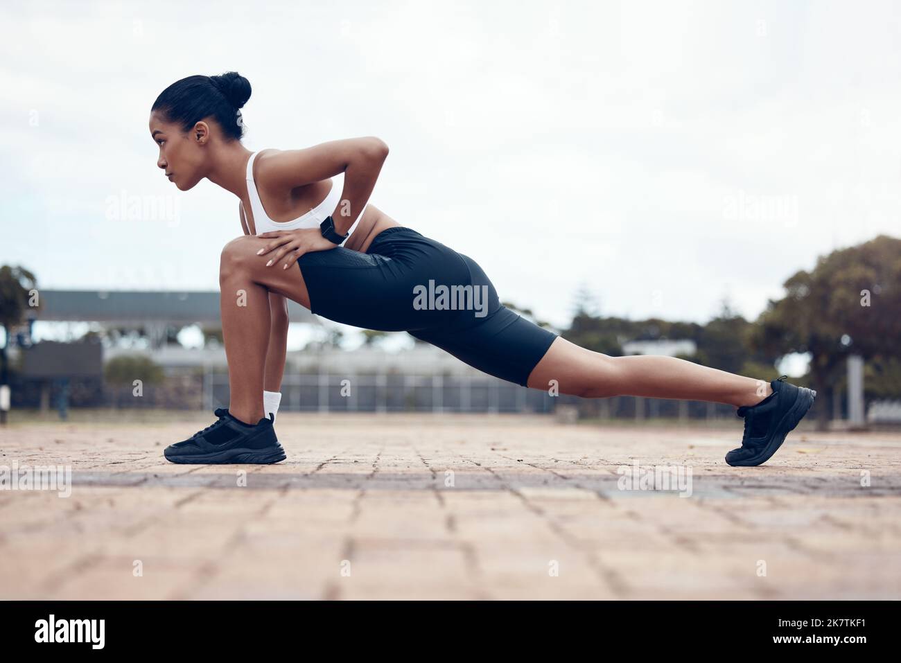 Exercise, black woman and stretching outdoor for training, fitness and ...