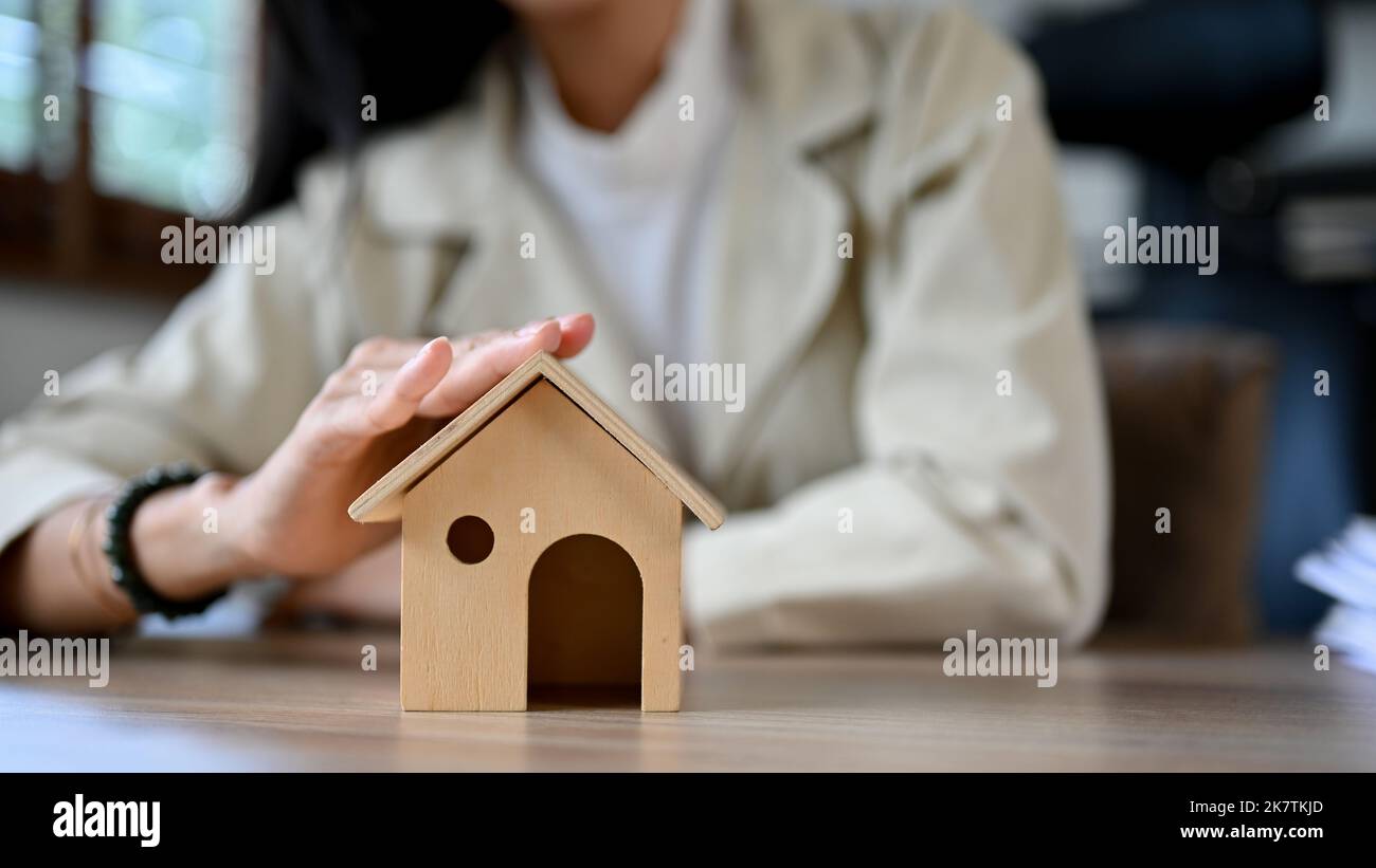 Close-up image, A female real estate agent or home insurance broker ...