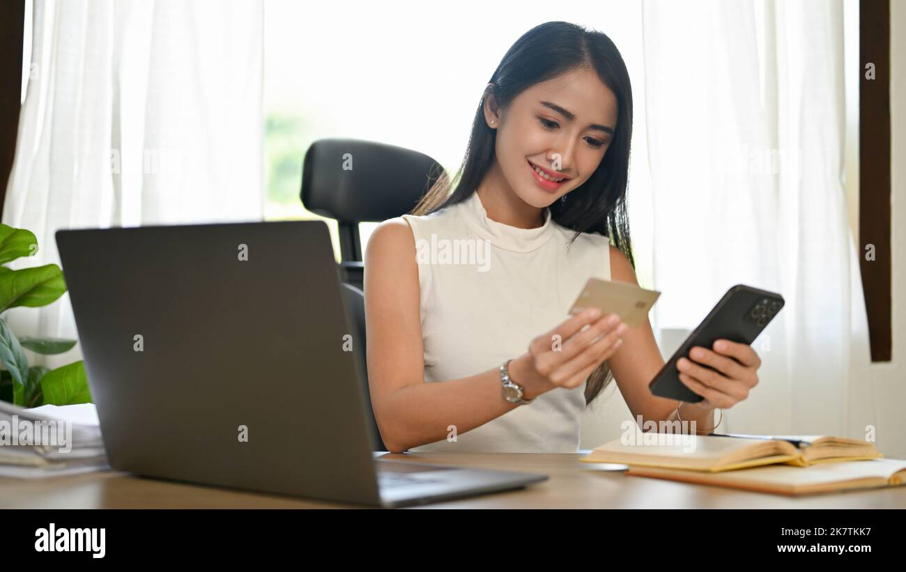 Gorgeous millennial Asian businesswoman or female manager register her ...