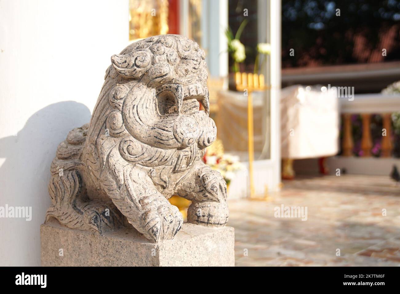 Asian white stone lion statue Chinese vintage style in front of temple ...