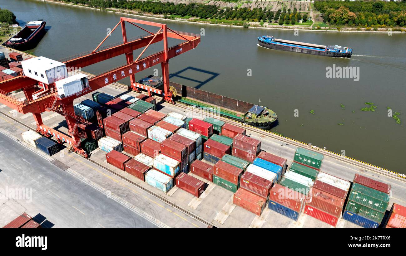 NANTONG, CHINA - OCTOBER 19, 2022 - Hoisting machines load and unload ...