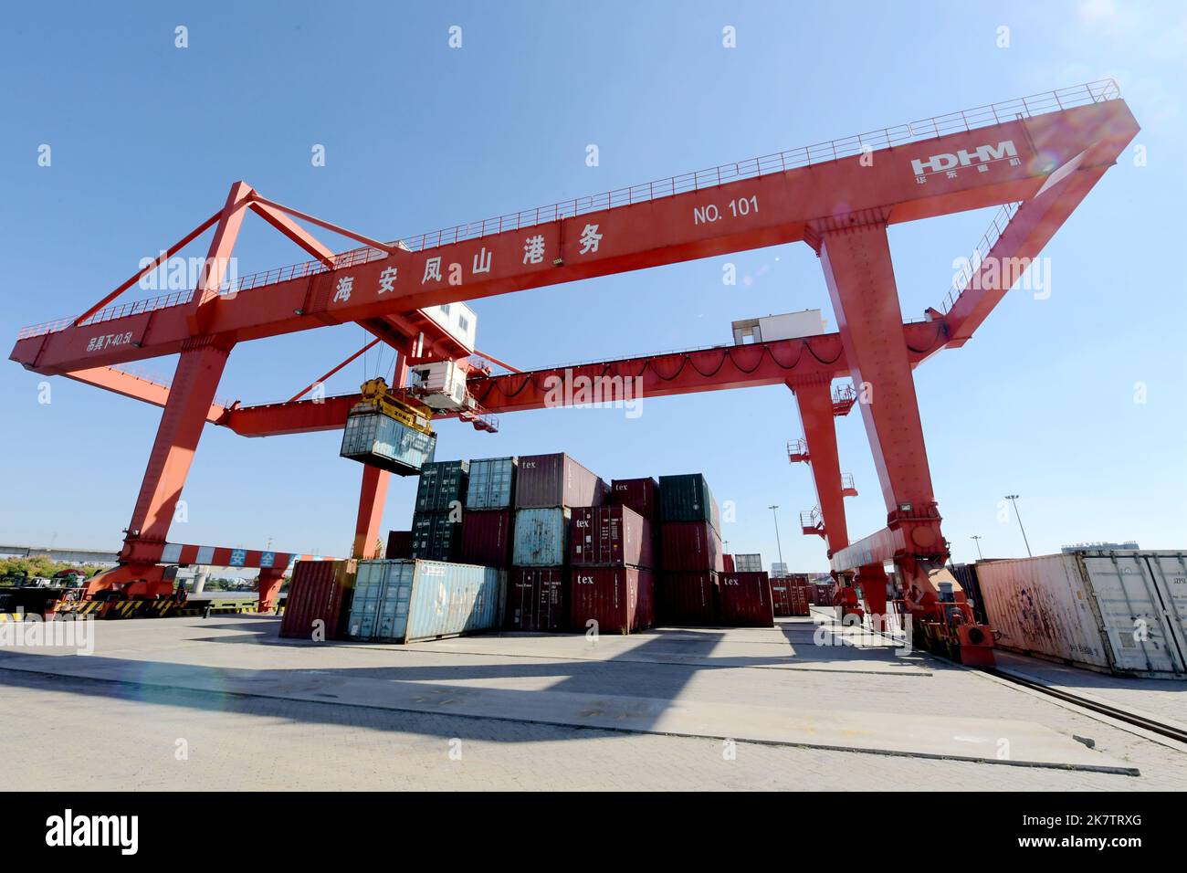 NANTONG, CHINA - OCTOBER 19, 2022 - Hoisting machines load and unload ...