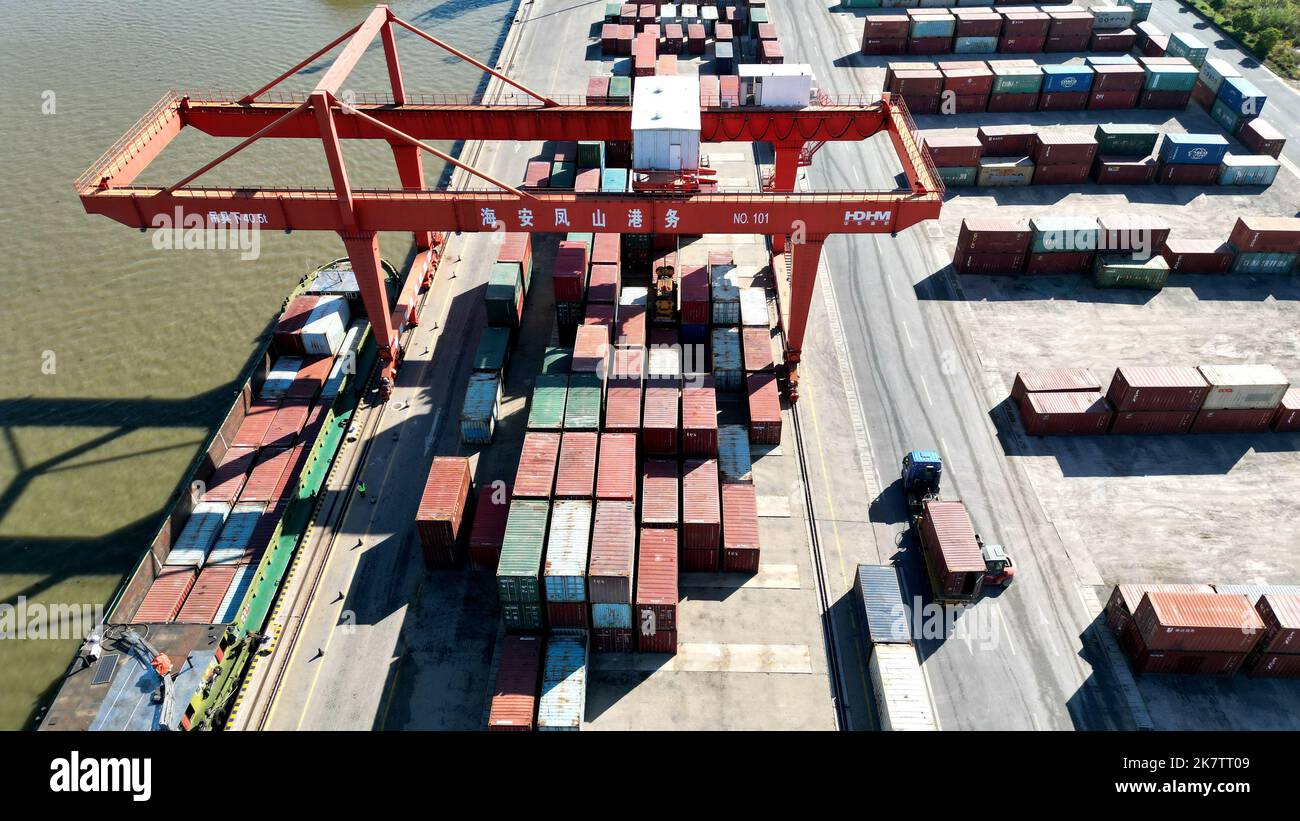 NANTONG, CHINA - OCTOBER 19, 2022 - Hoisting machines load and unload ...