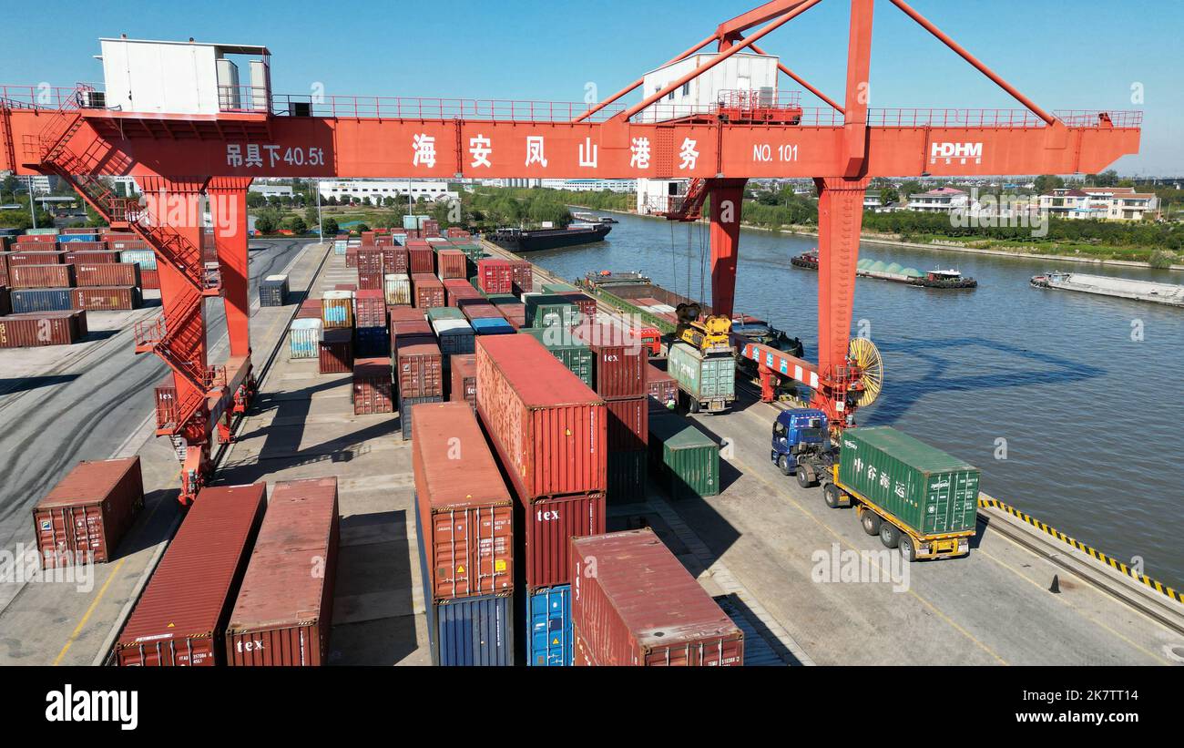 NANTONG, CHINA - OCTOBER 19, 2022 - Hoisting machines load and unload ...