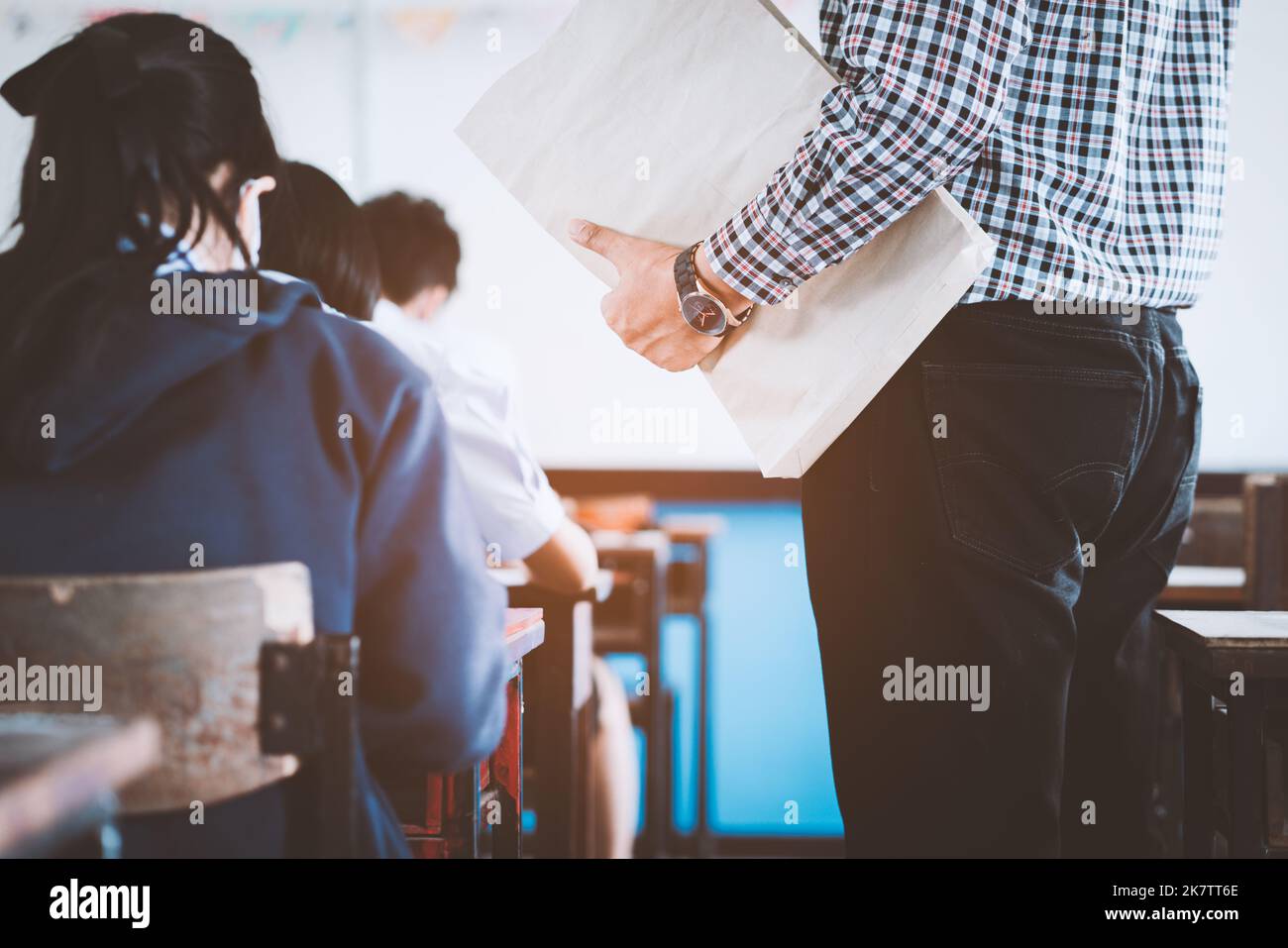 The teacher controls the exam room for students to take the exam in the ...