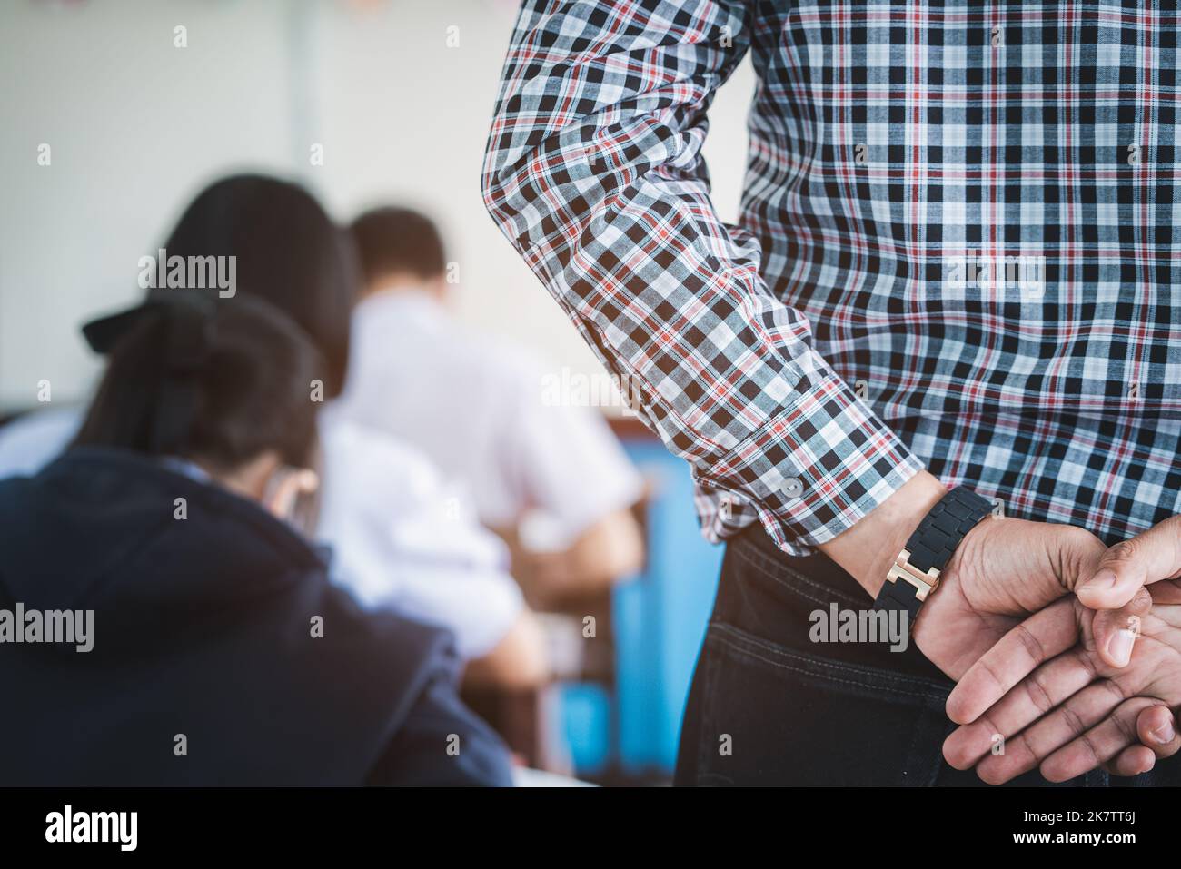 The teacher controls the exam room for students to take the exam in the ...