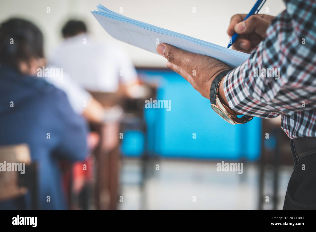 The teacher controls the exam room for students to take the exam in the ...