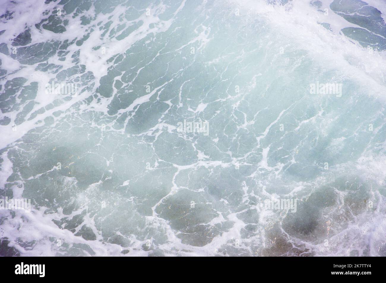 Ocean waves and sea foam, at the tropical island in the Philippines ...