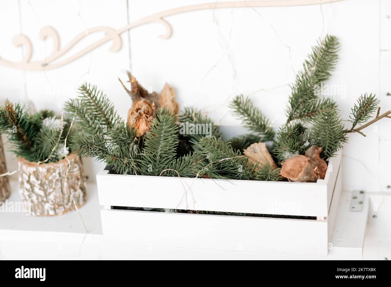 Christmas composition. Wooden box with Christmas fir branches and ...