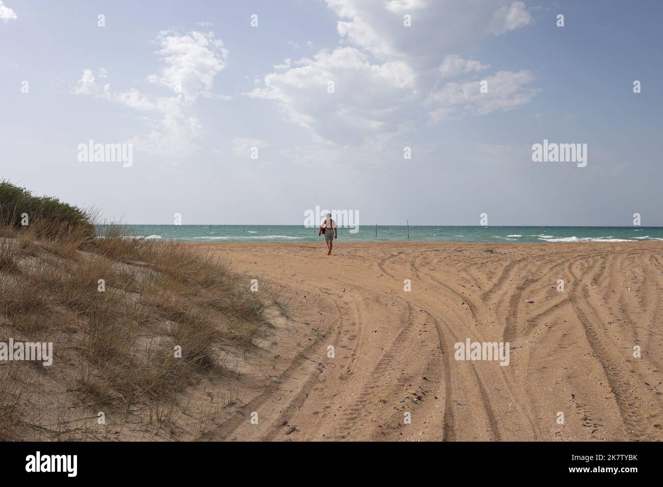 Sea access to the beach. Wide access to the beach with sand and grass ...