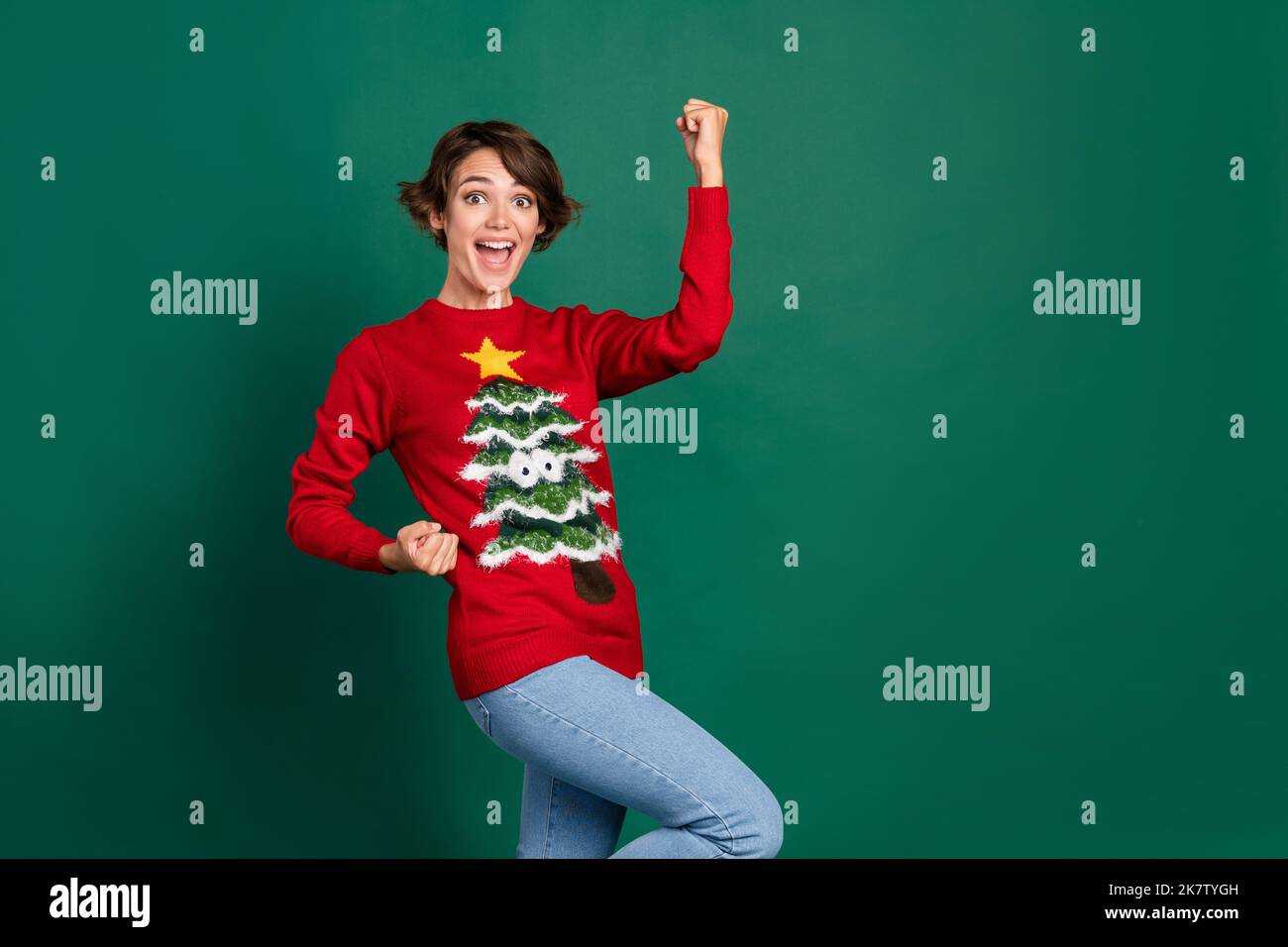 Photo of astonished lady stylish ugly jumper raise hand arm win lottery ...