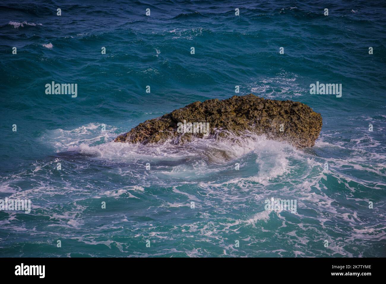 Sea spray and foam, rock and waves, ocean scenery on paradise island ...