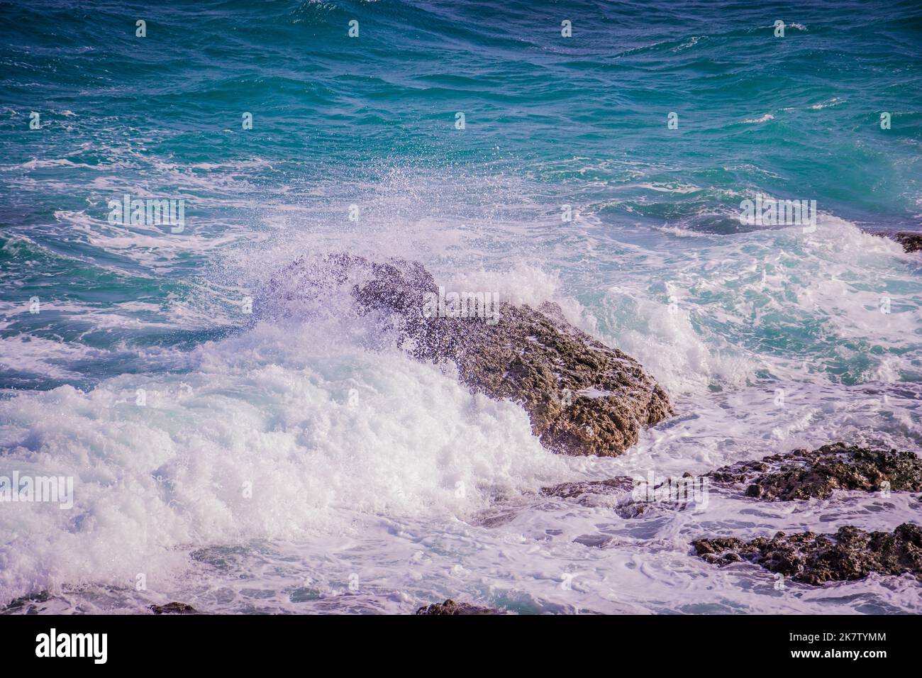 Sea spray and foam, rock and waves, ocean scenery on paradise island ...