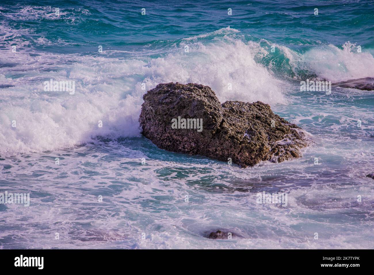 Sea spray and foam, rock and waves, ocean scenery on paradise island ...