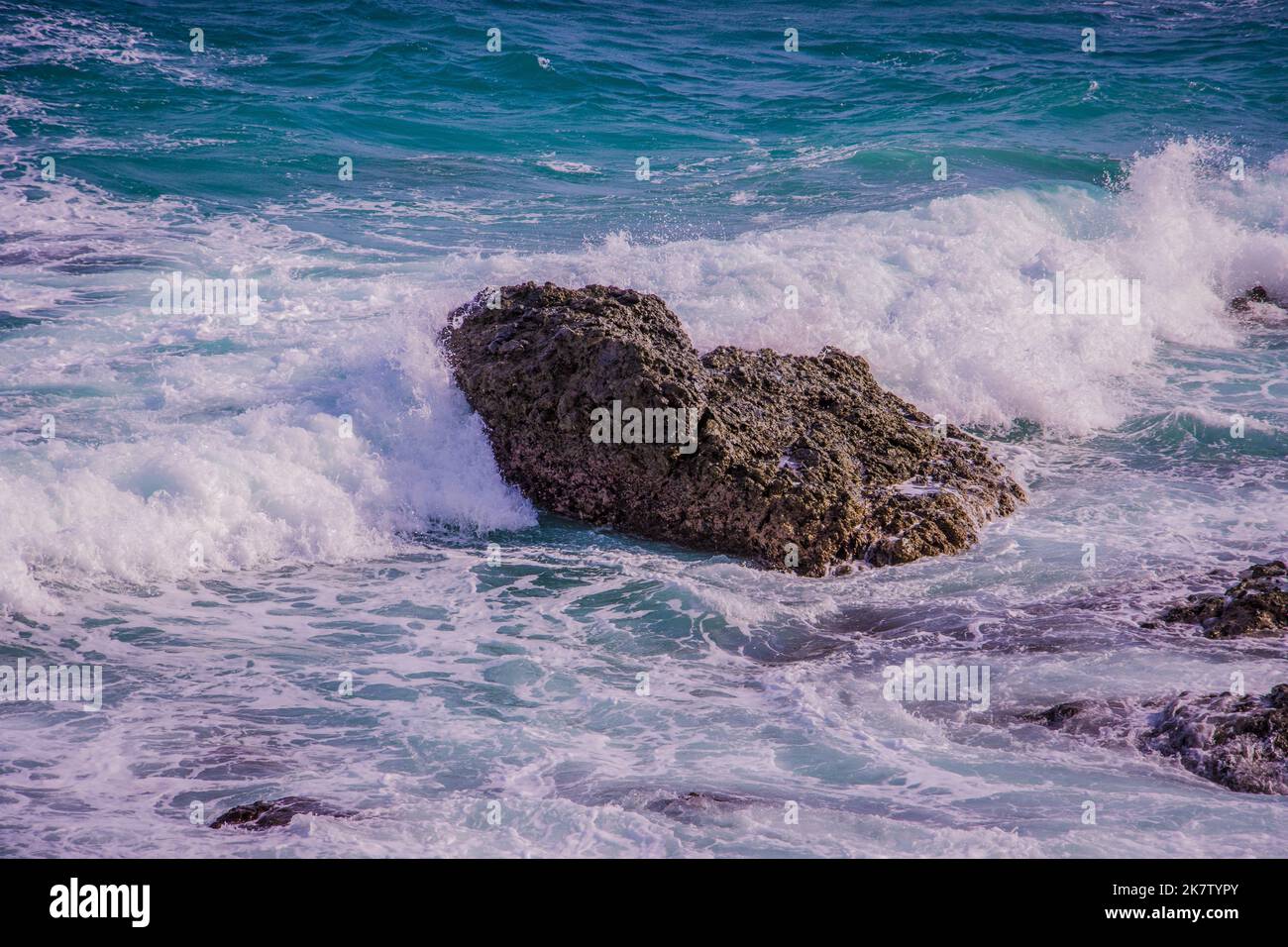 Sea spray and foam, rock and waves, ocean scenery on paradise island ...