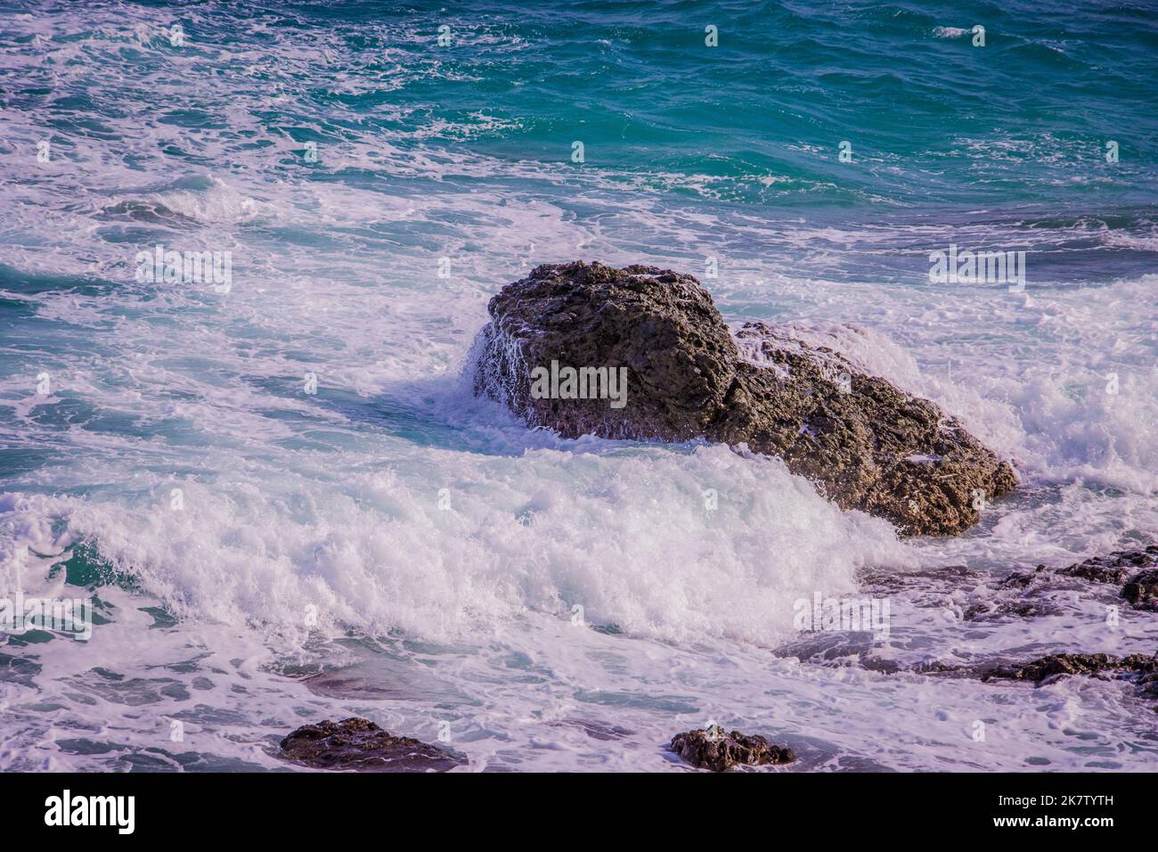 Sea spray and foam, rock and waves, ocean scenery on paradise island ...