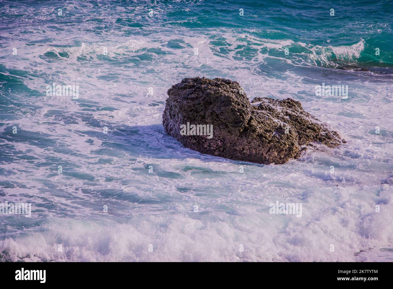 Sea spray and foam, rock and waves, ocean scenery on paradise island ...