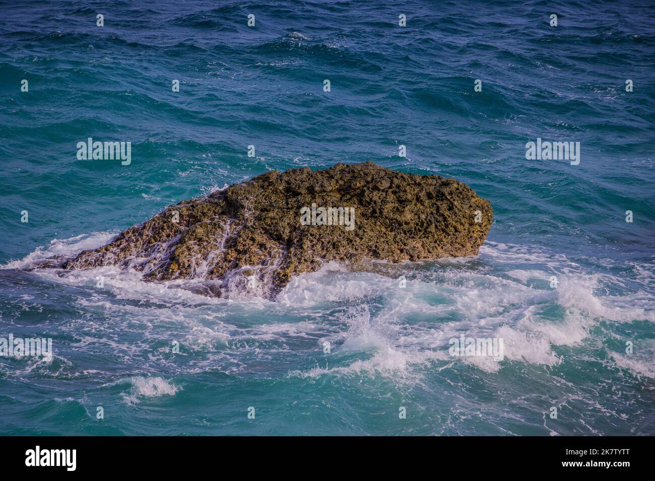 Sea spray and foam, rock and waves, ocean scenery on paradise island ...