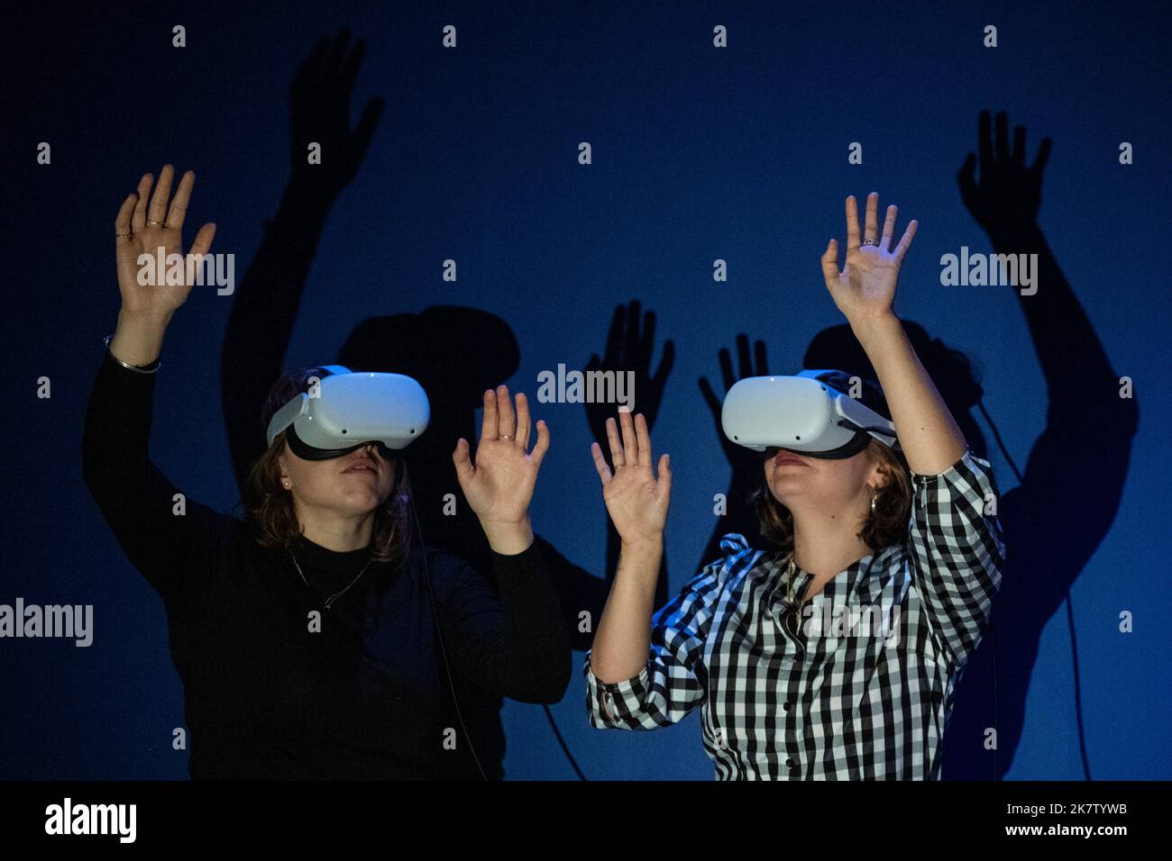 London, UK. 19 October 2022. Staff members wearing VR headsets ...