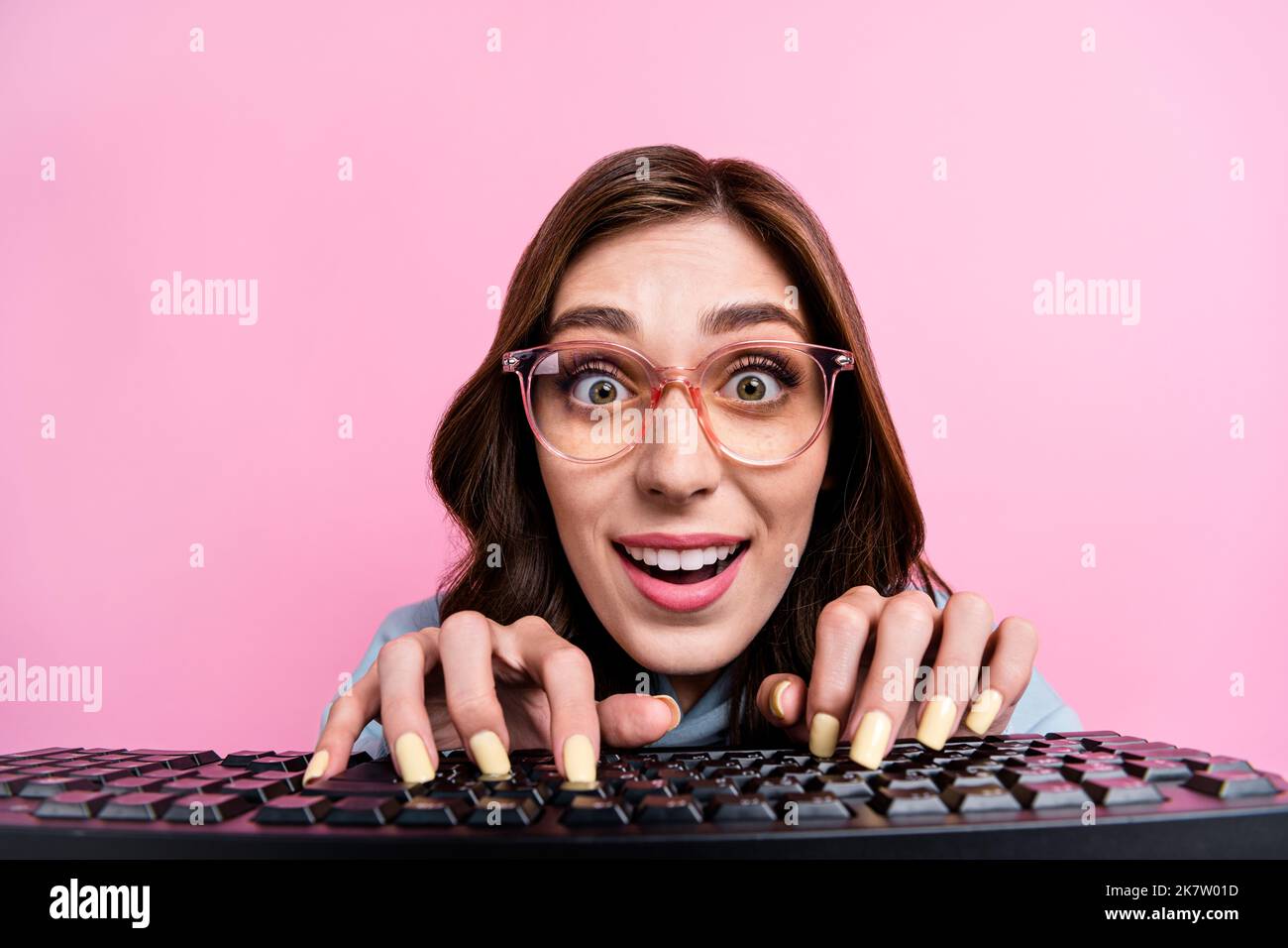 Portrait of cheerful amazed lady toothy smile fingers typing keyboard ...