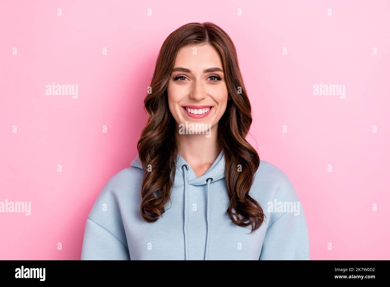 Photo of pretty cheerful girl dressed grey sweatshirt smiling white ...