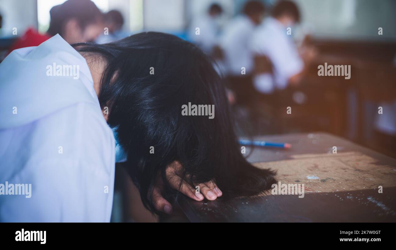 Nervous teen sitting in classroom hi-res stock photography and images ...
