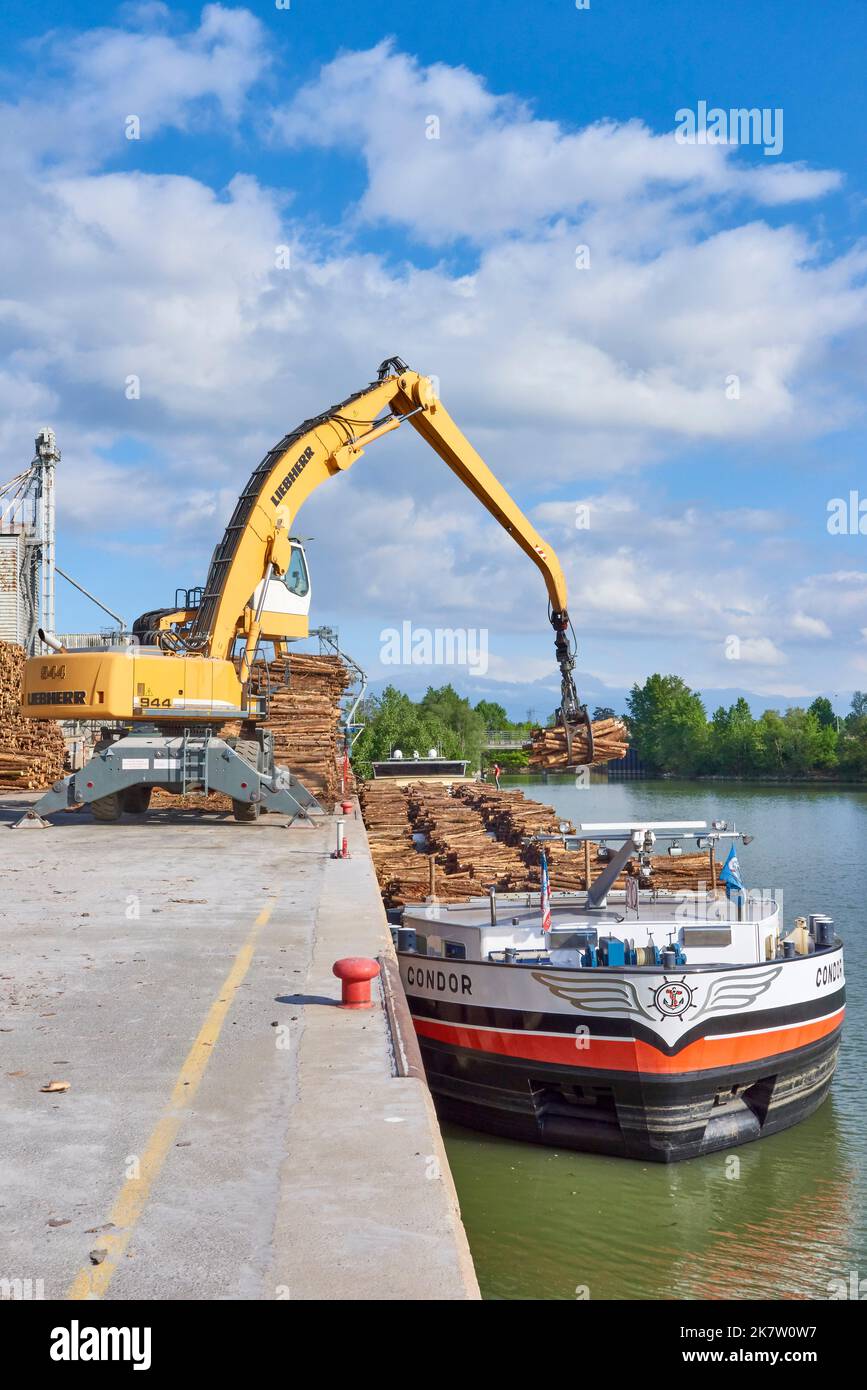 Large barge “Le Condor” loaded with wood in the river port of ...