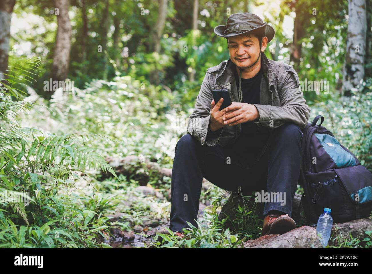 Happy male tourist backpack looks hi-res stock photography and images ...