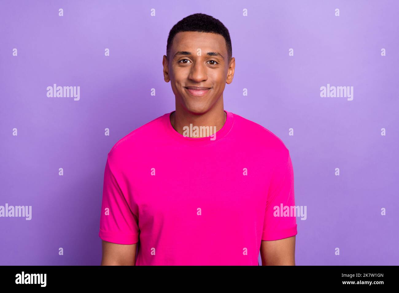 Portrait of attractive handsome positive man with fade haircut wear ...