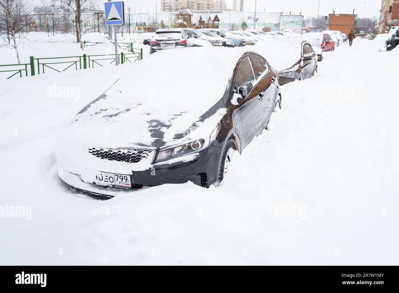 Russia Moscow 13.02.2021 Cars on street covered with snow. City winter ...