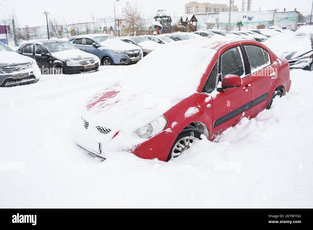 Russia Moscow 13.02.2021 Cars on street covered with snow. City winter ...