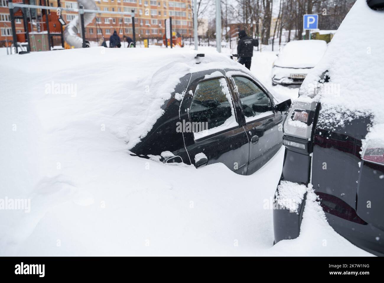 Russia Moscow 13.02.2021 Cars on street covered with snow. City winter ...