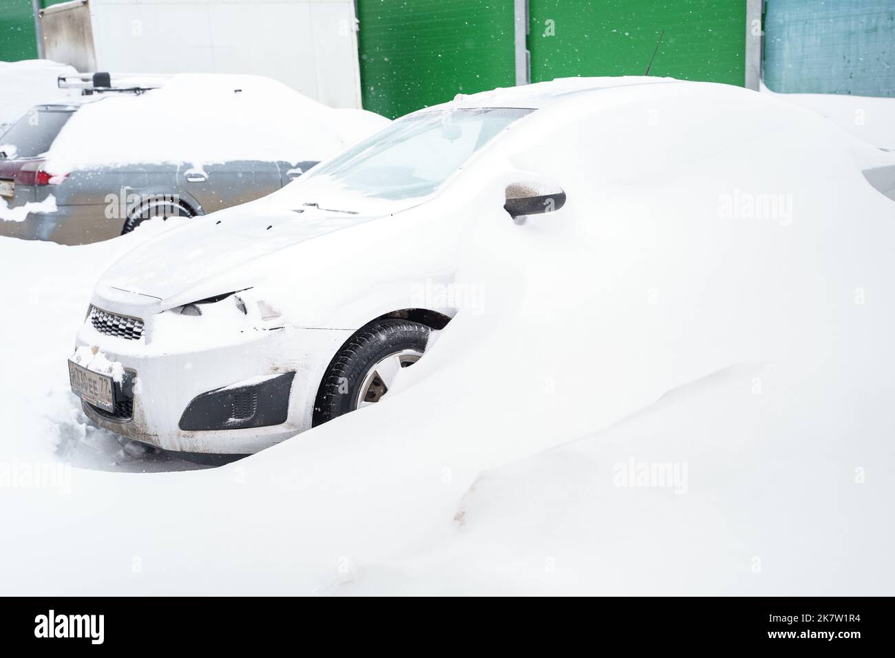 Russia Moscow 13.02.2021 Cars on street covered with snow. City winter ...