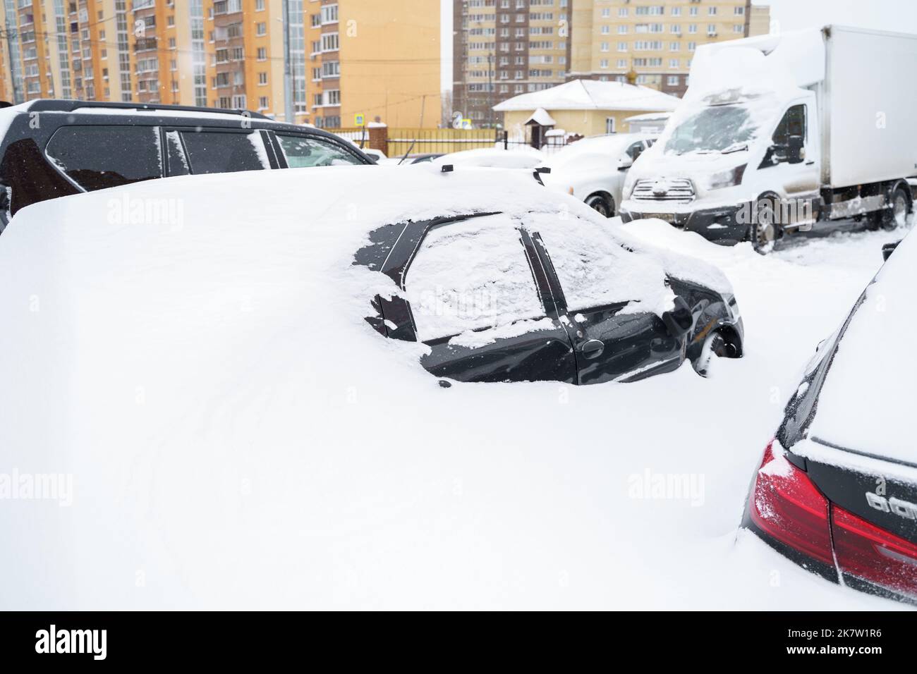 Russia Moscow 13.02.2021 Cars on street covered with snow. City winter ...
