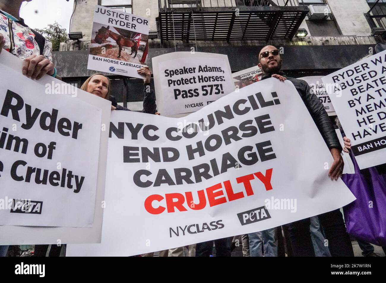 Protesters gather with placards for a Memorial for Ryder, a NYC ...